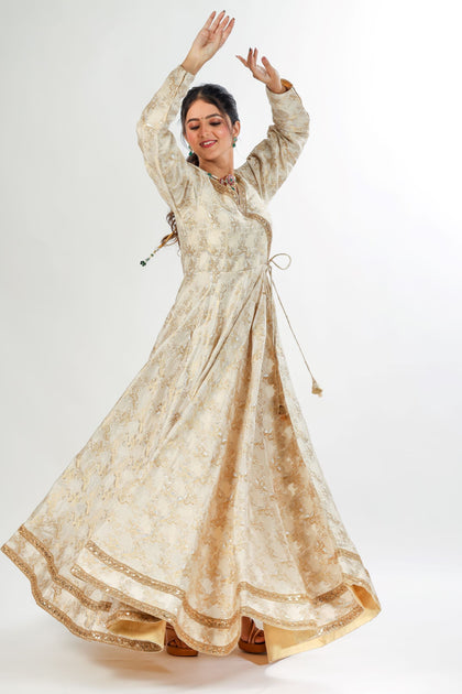 MEKSHA - Ivory and gold Angrakha Kurta gown with attached tassels – Saangi
